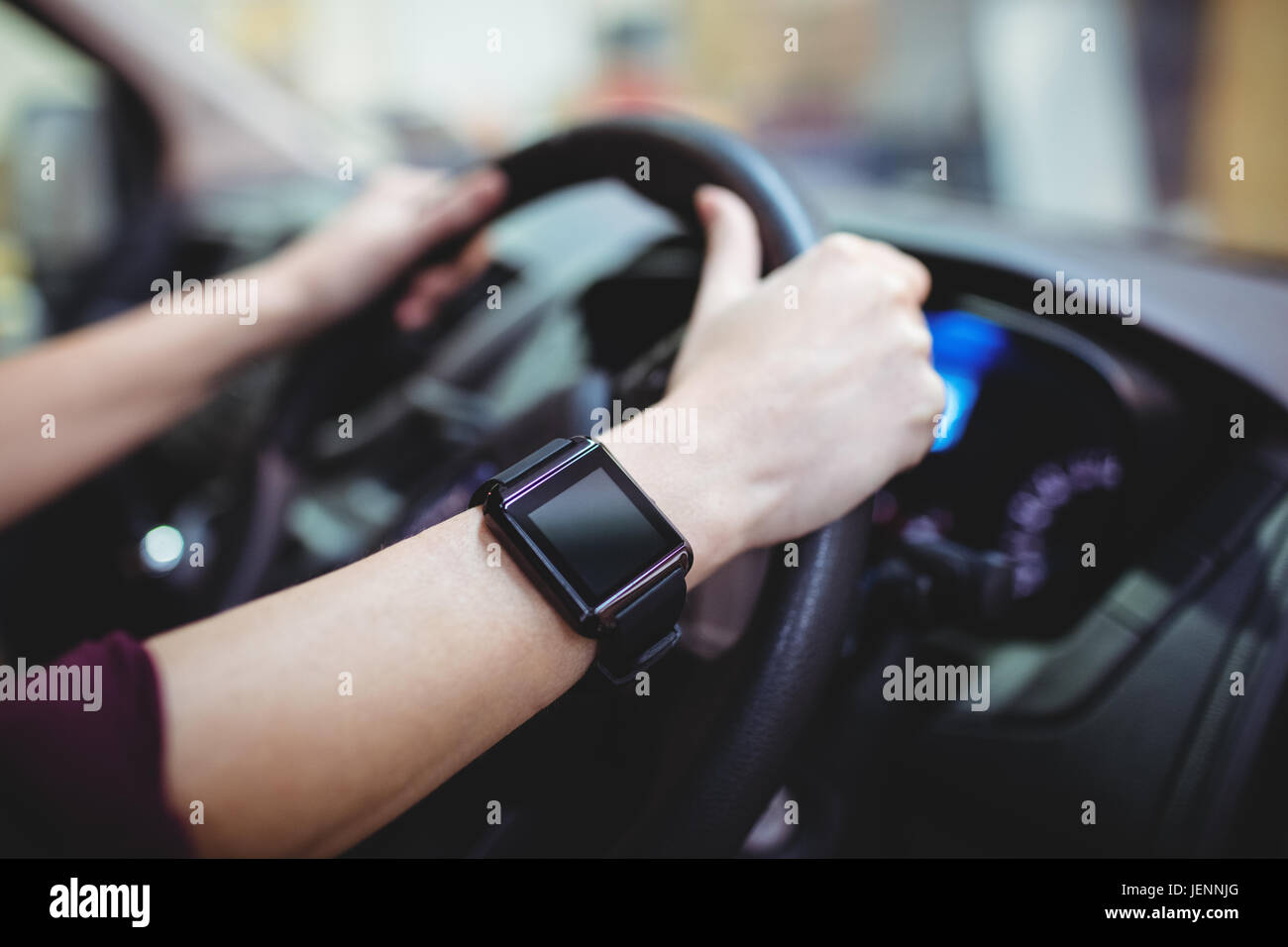 Close up of driver with smart watch Stock Photo - Alamy