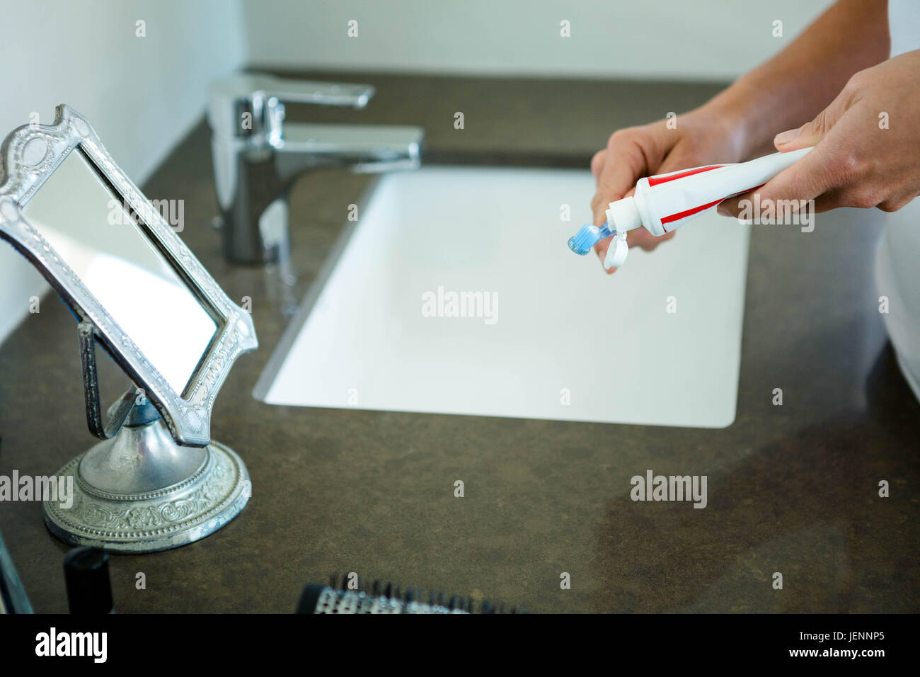 Squeezing toothpaste hi-res stock photography and images - Alamy