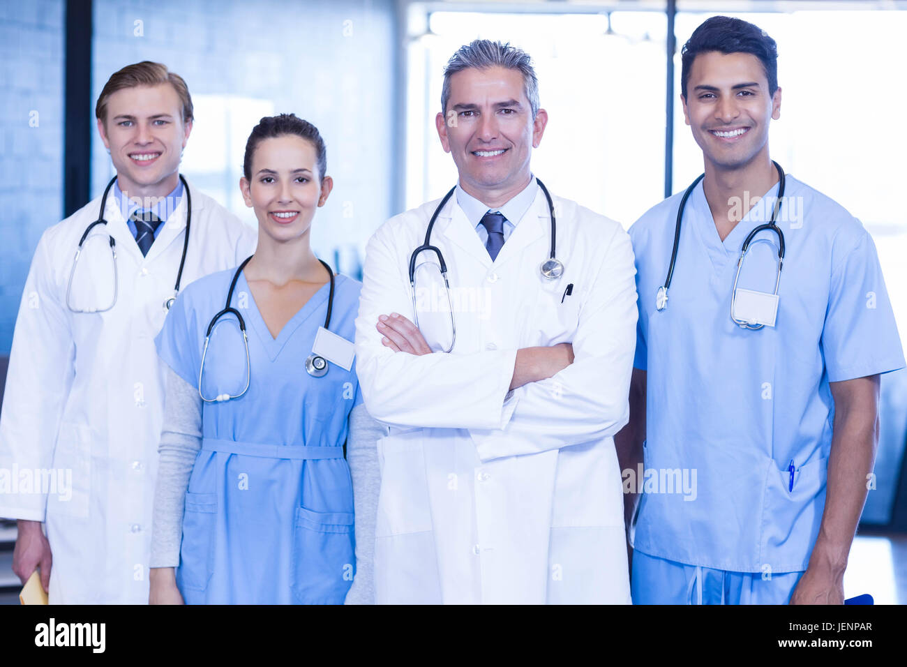 Portrait of medical team standing together Stock Photo - Alamy