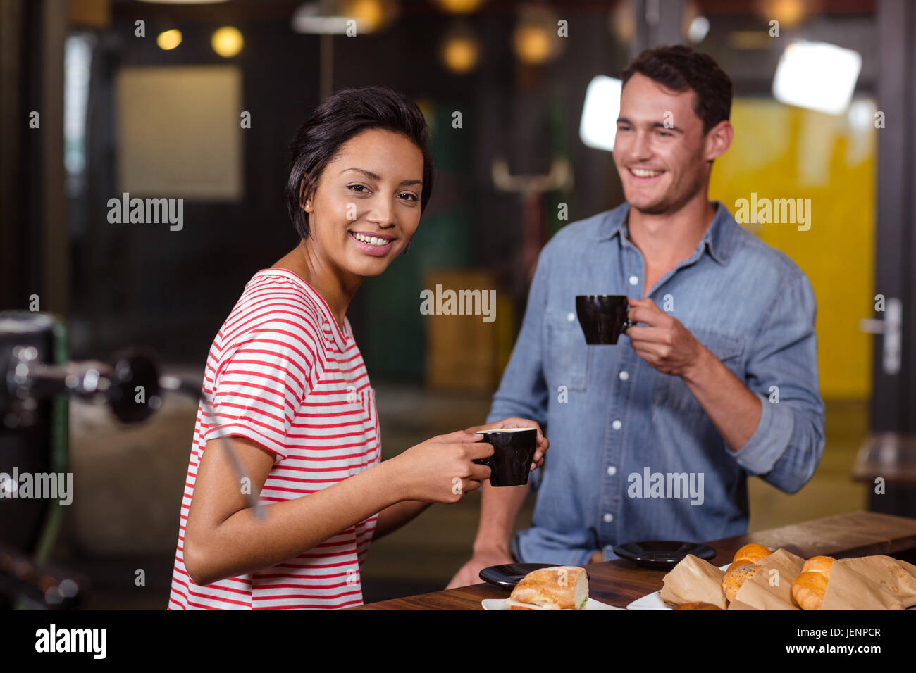 Beautiful young couple having discussion hi-res stock photography and ...
