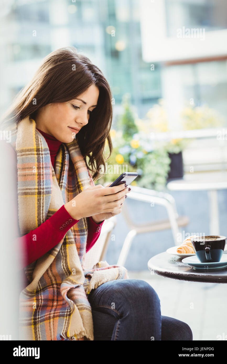 Woman using her smartphone Stock Photo - Alamy