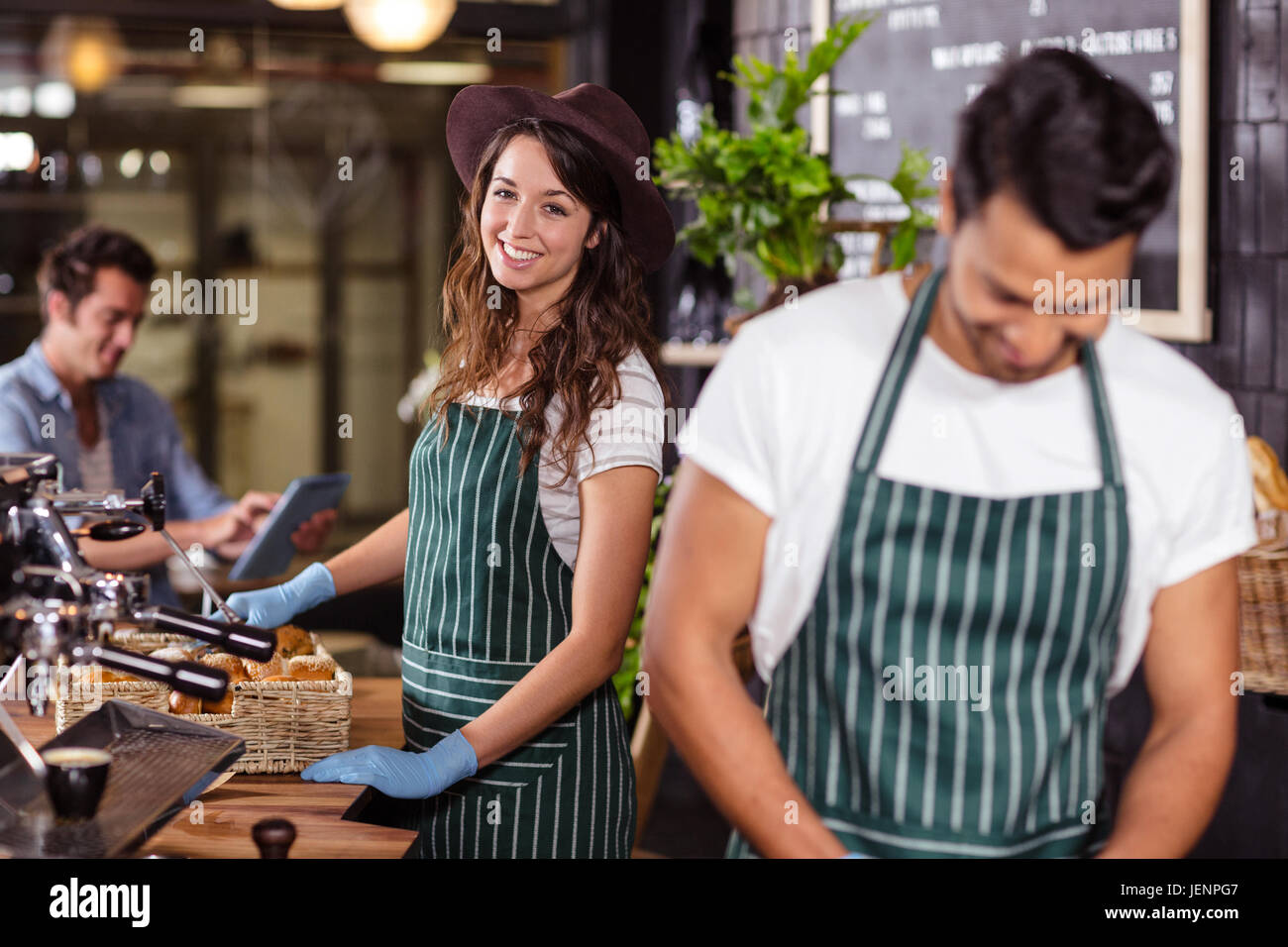 Indian woman barista standing hi-res stock photography and images - Alamy