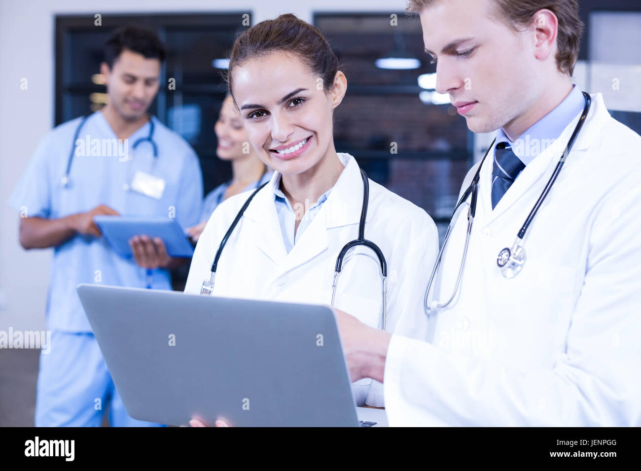 Indian male doctor looking laptop hi-res stock photography and images ...