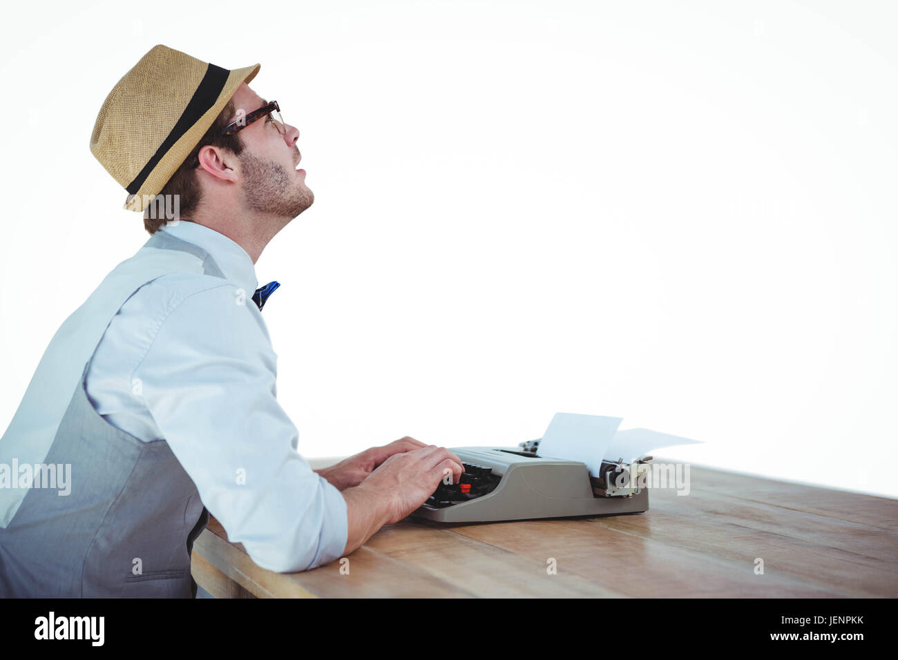 Handsome man using old fashioned typewriter Stock Photo - Alamy
