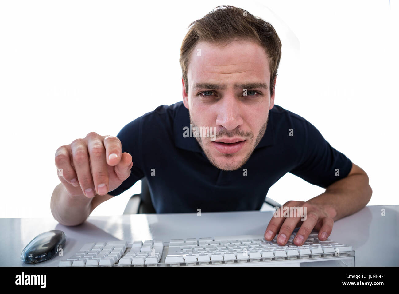 Handsome man using computer Stock Photo - Alamy