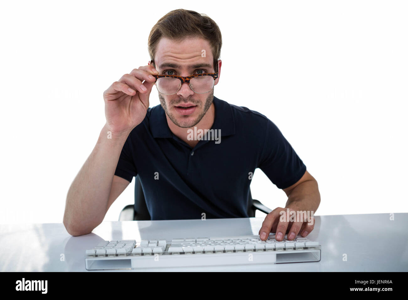 Handsome man using computer Stock Photo - Alamy