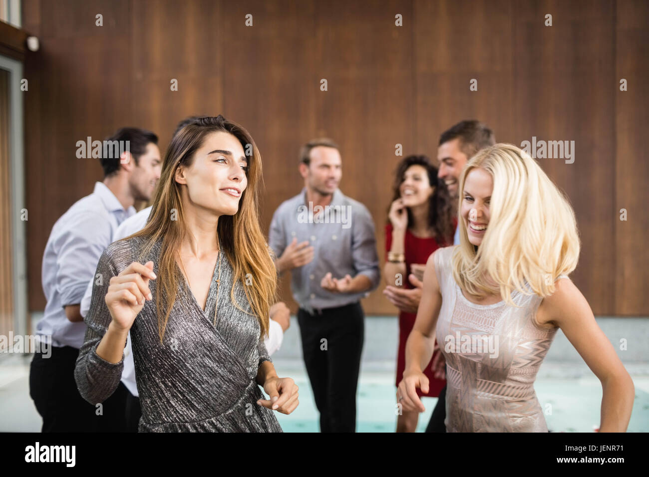 Group of young friends dancing Stock Photo - Alamy
