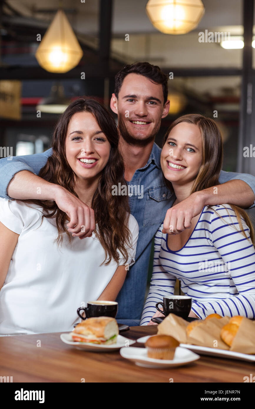 Portrait of smiling friends Stock Photo - Alamy