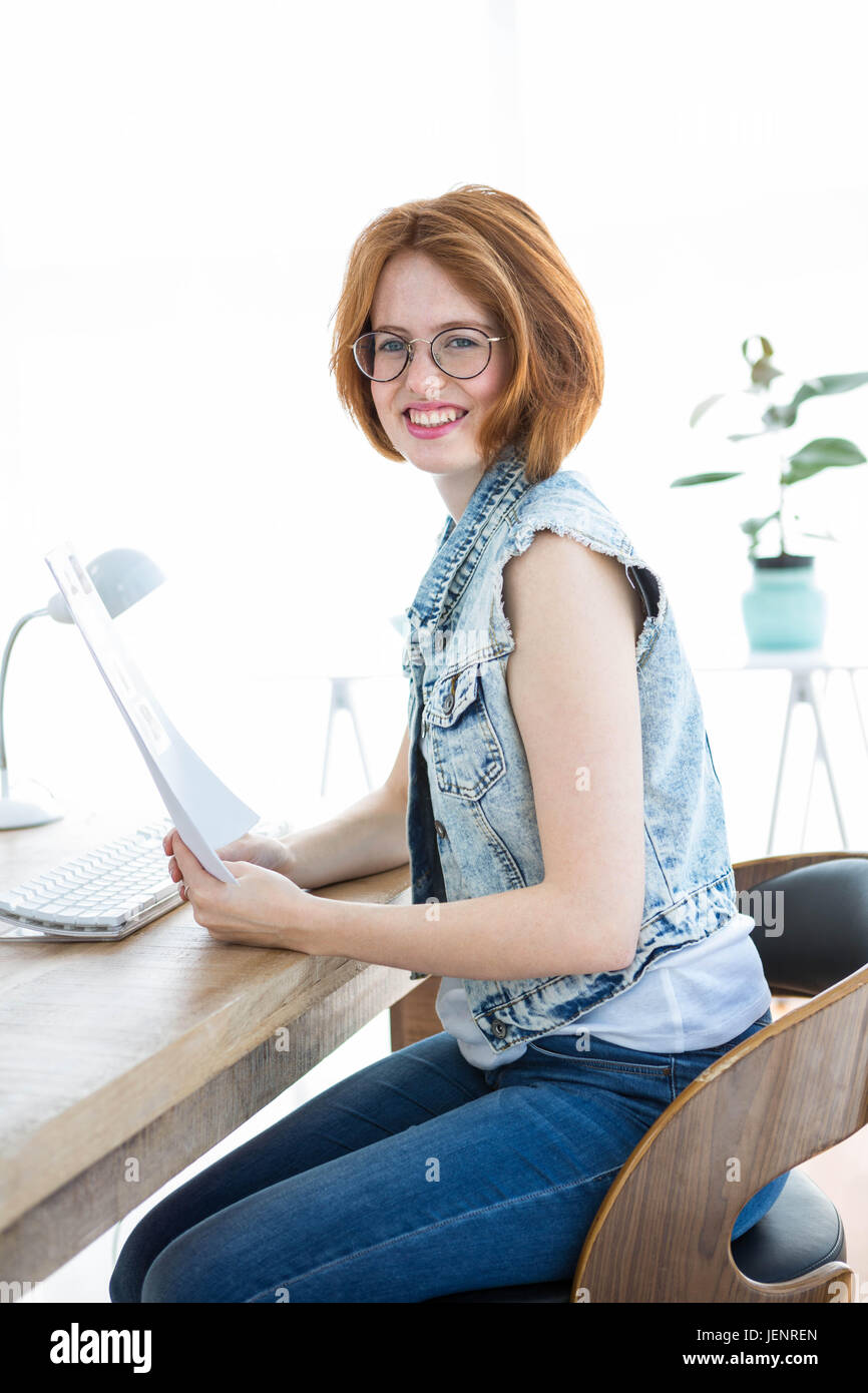Young woman filing paperwork hi-res stock photography and images - Alamy