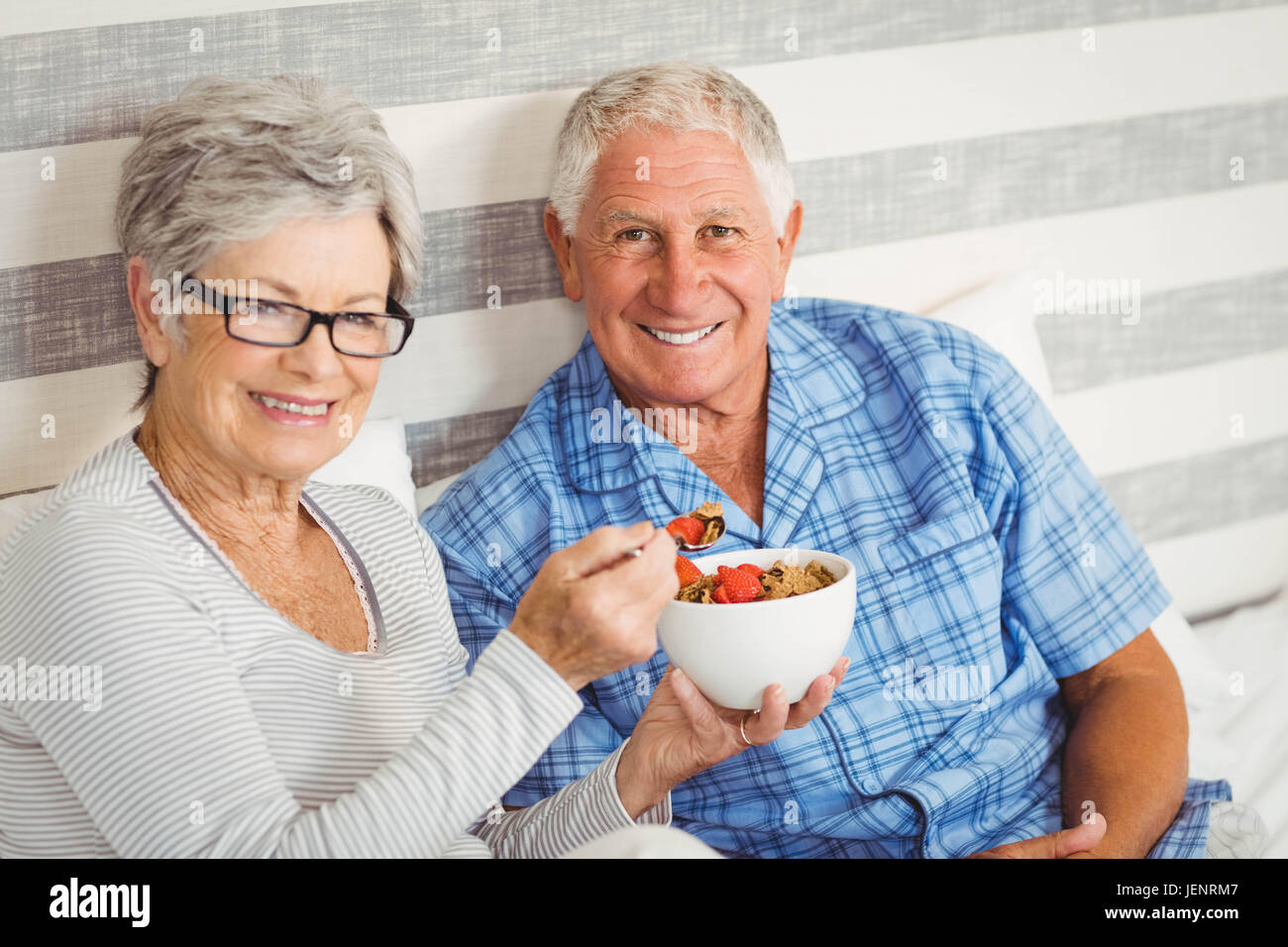 Elderly couple at home in bedroom hi-res stock photography and images ...