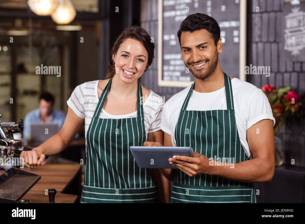 Male female baristas using hi-res stock photography and images - Alamy