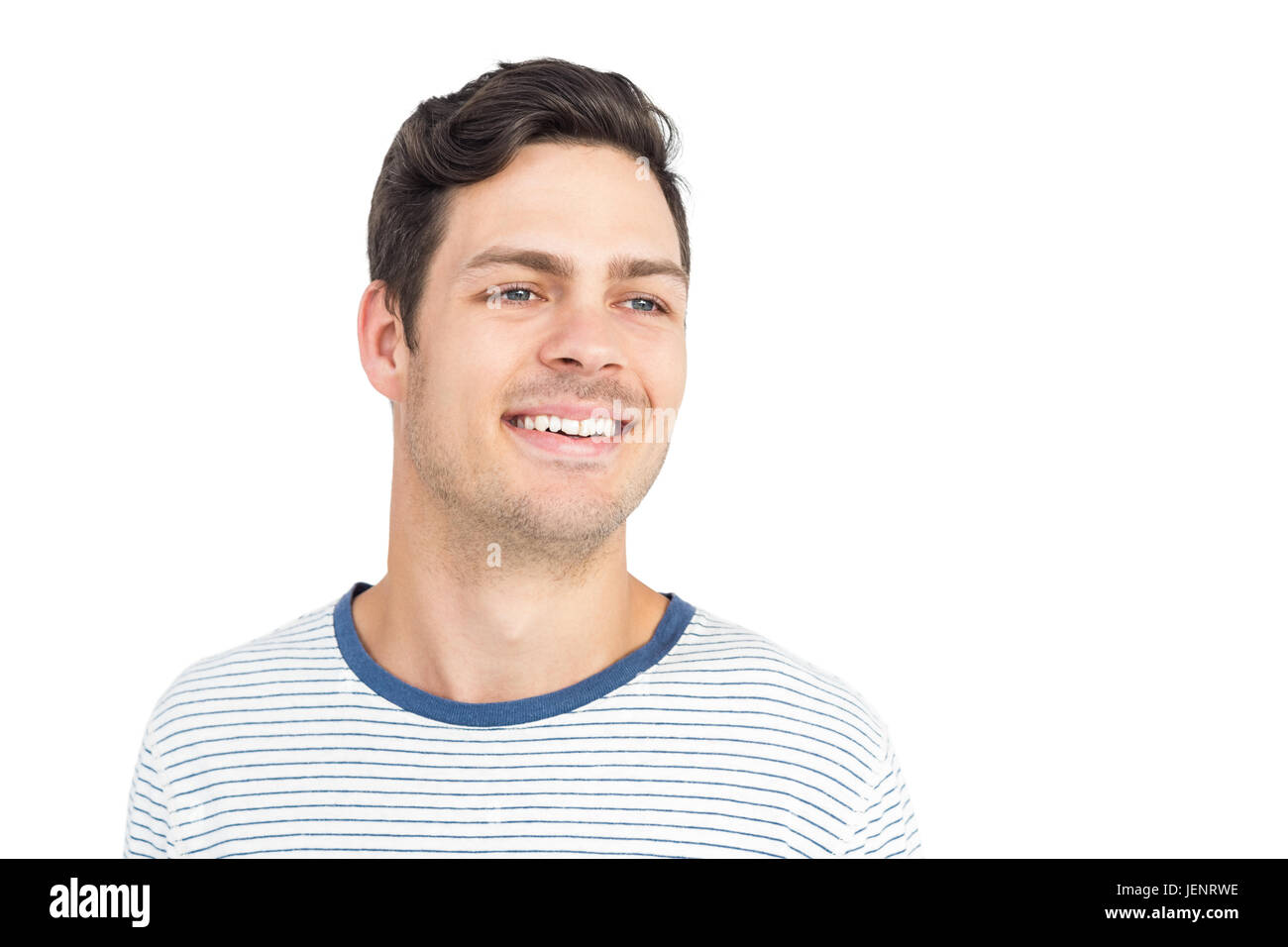 Young man smiling at camera Stock Photo - Alamy