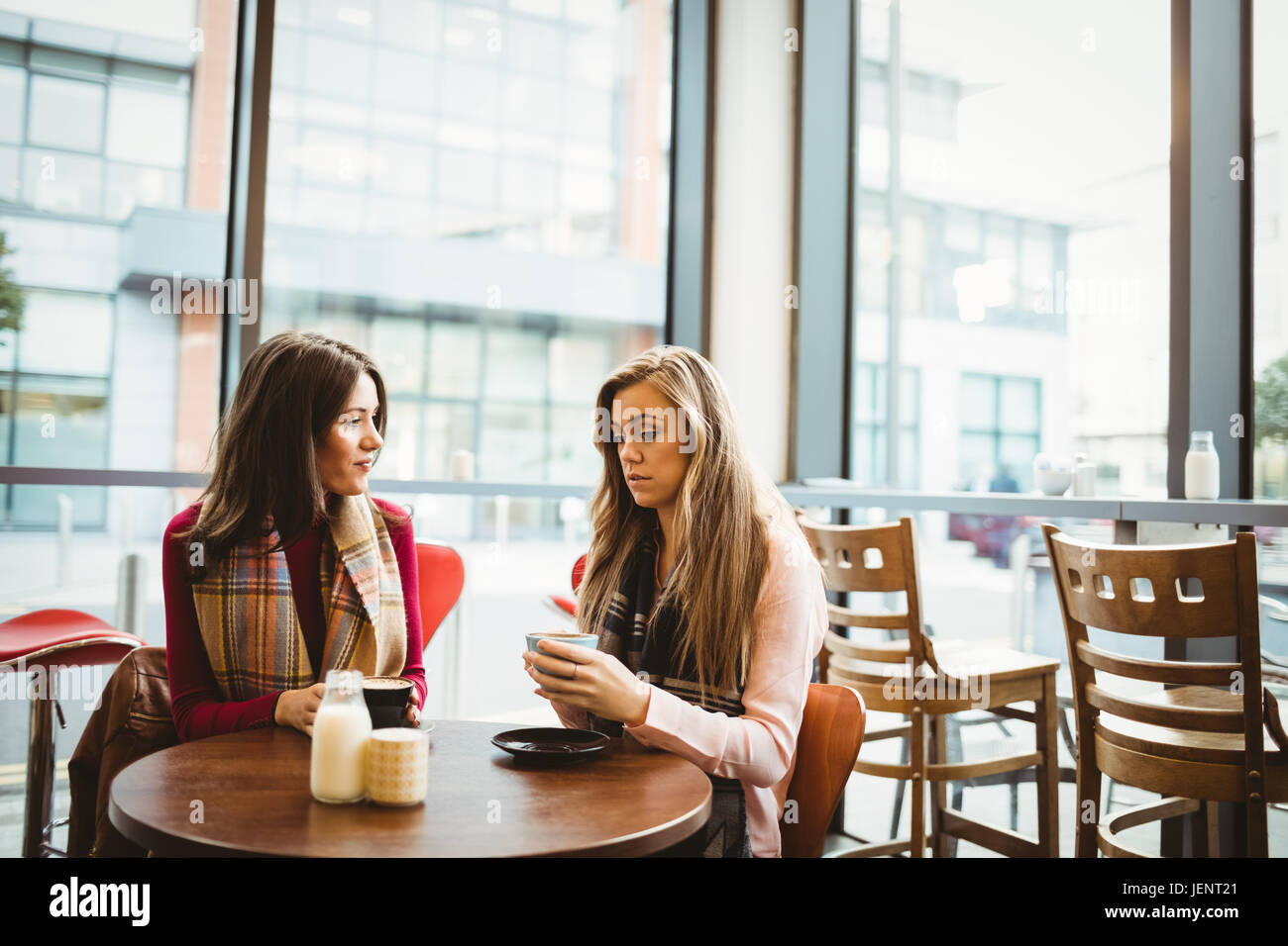 Cheerful friends having break coffee hi-res stock photography and ...