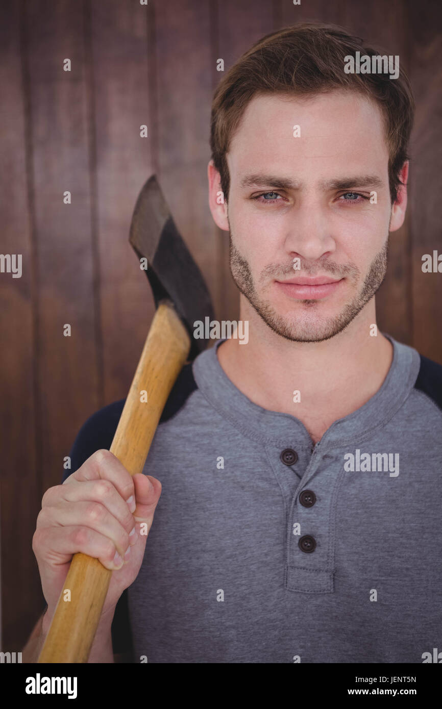 Smiling man holding axe hi-res stock photography and images - Alamy