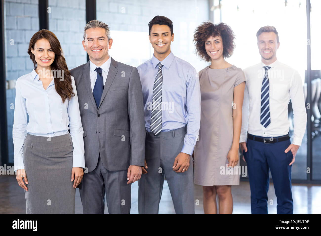 Portrait friendly business team posing hi-res stock photography and ...