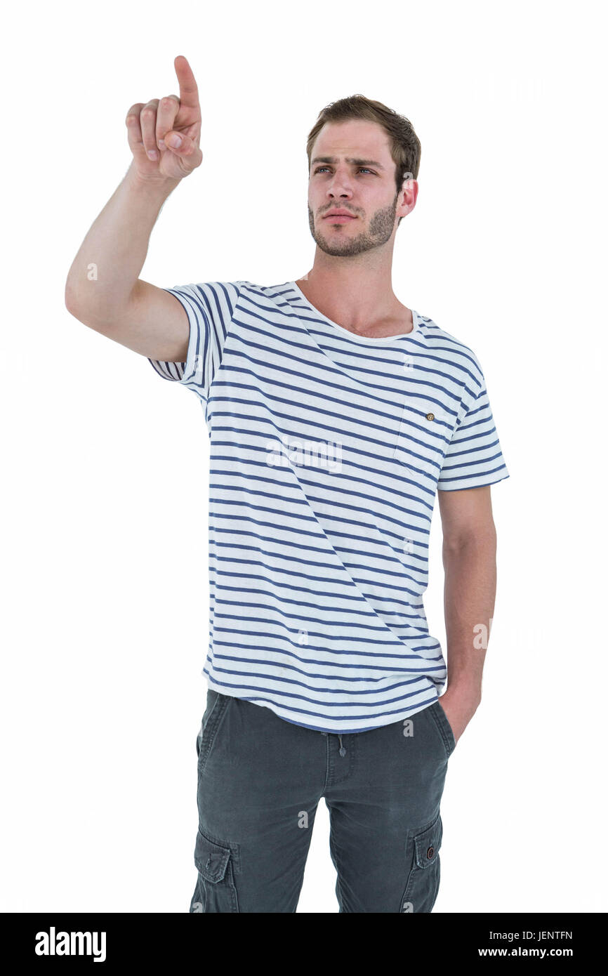 Hipster man pointing in the air Stock Photo - Alamy