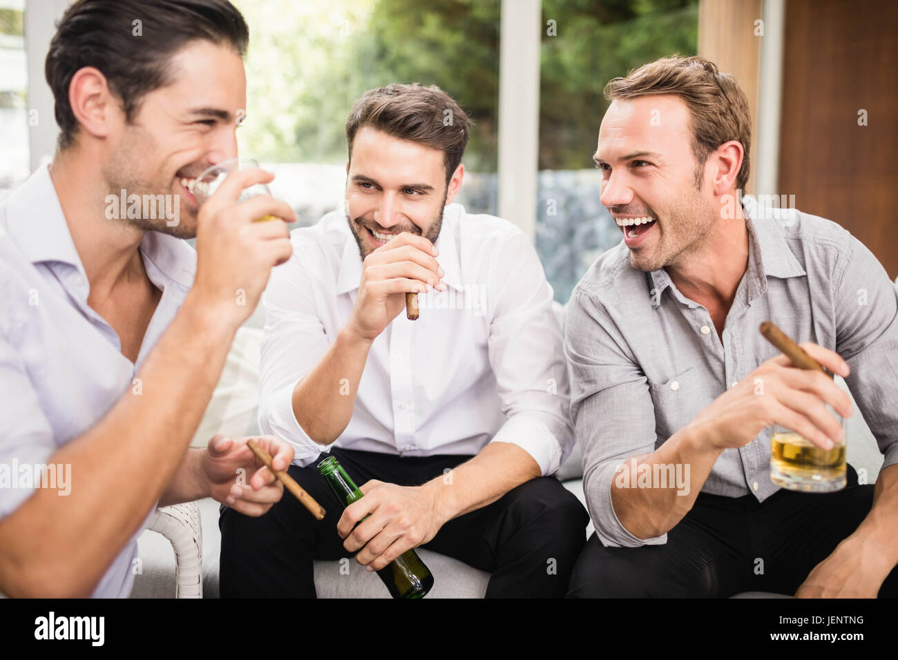 Group of men discussing Stock Photo - Alamy