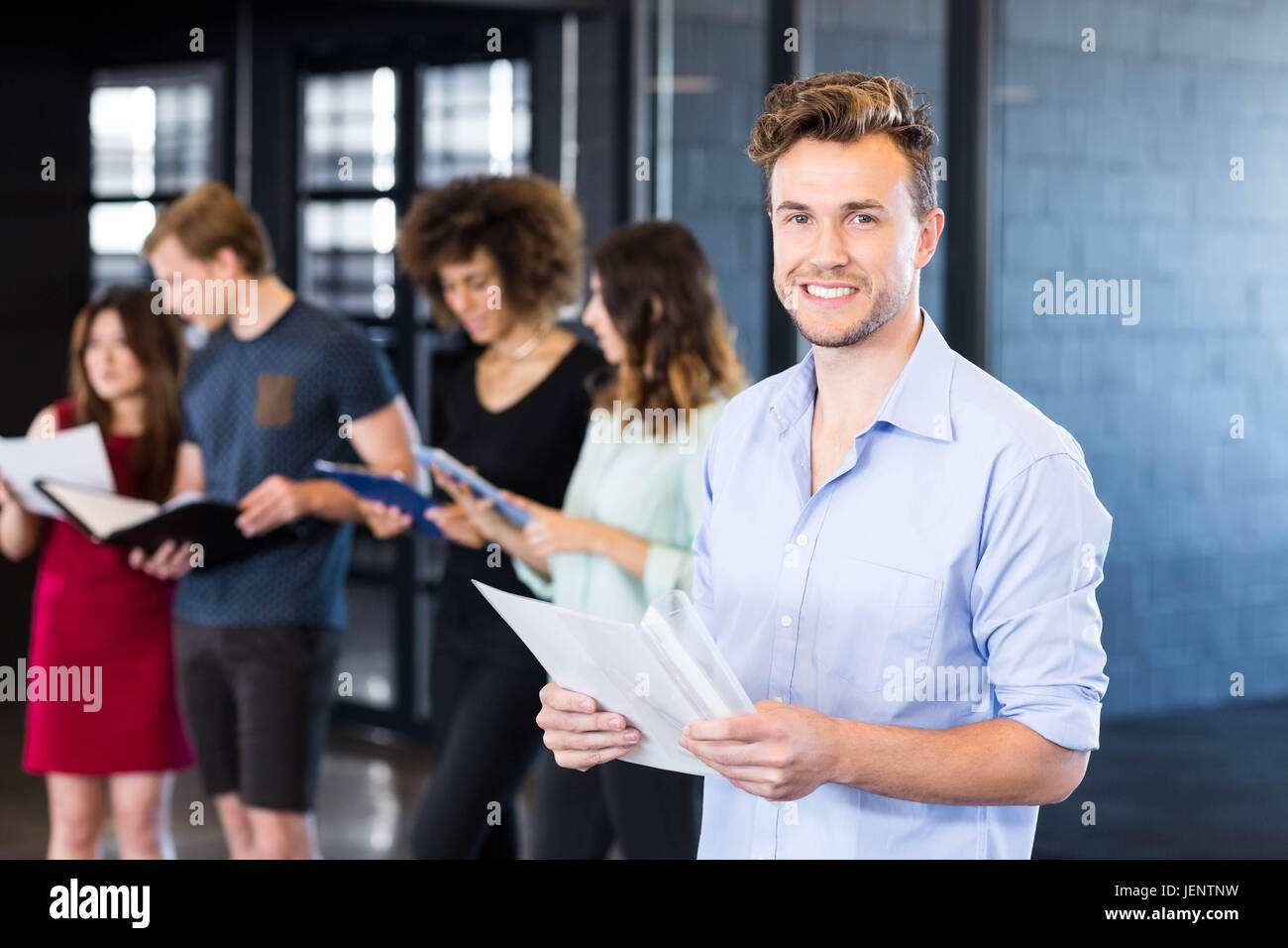 Female executives holding document hi-res stock photography and images ...