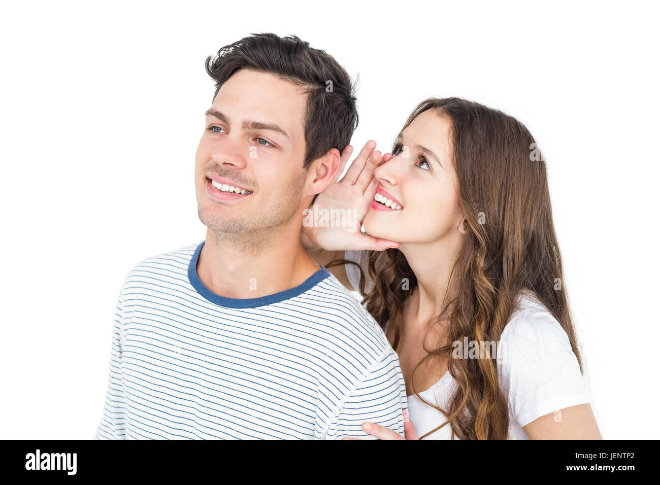 Young couple sharing a secret Stock Photo - Alamy