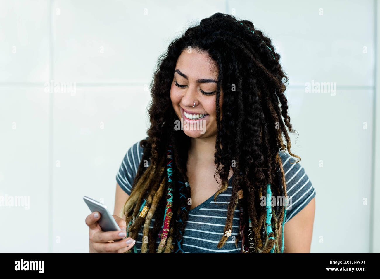 Woman typing a text message Stock Photo - Alamy