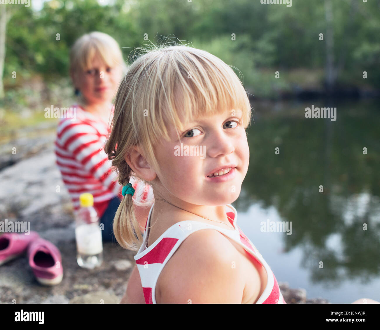 Girls at water Stock Photo - Alamy