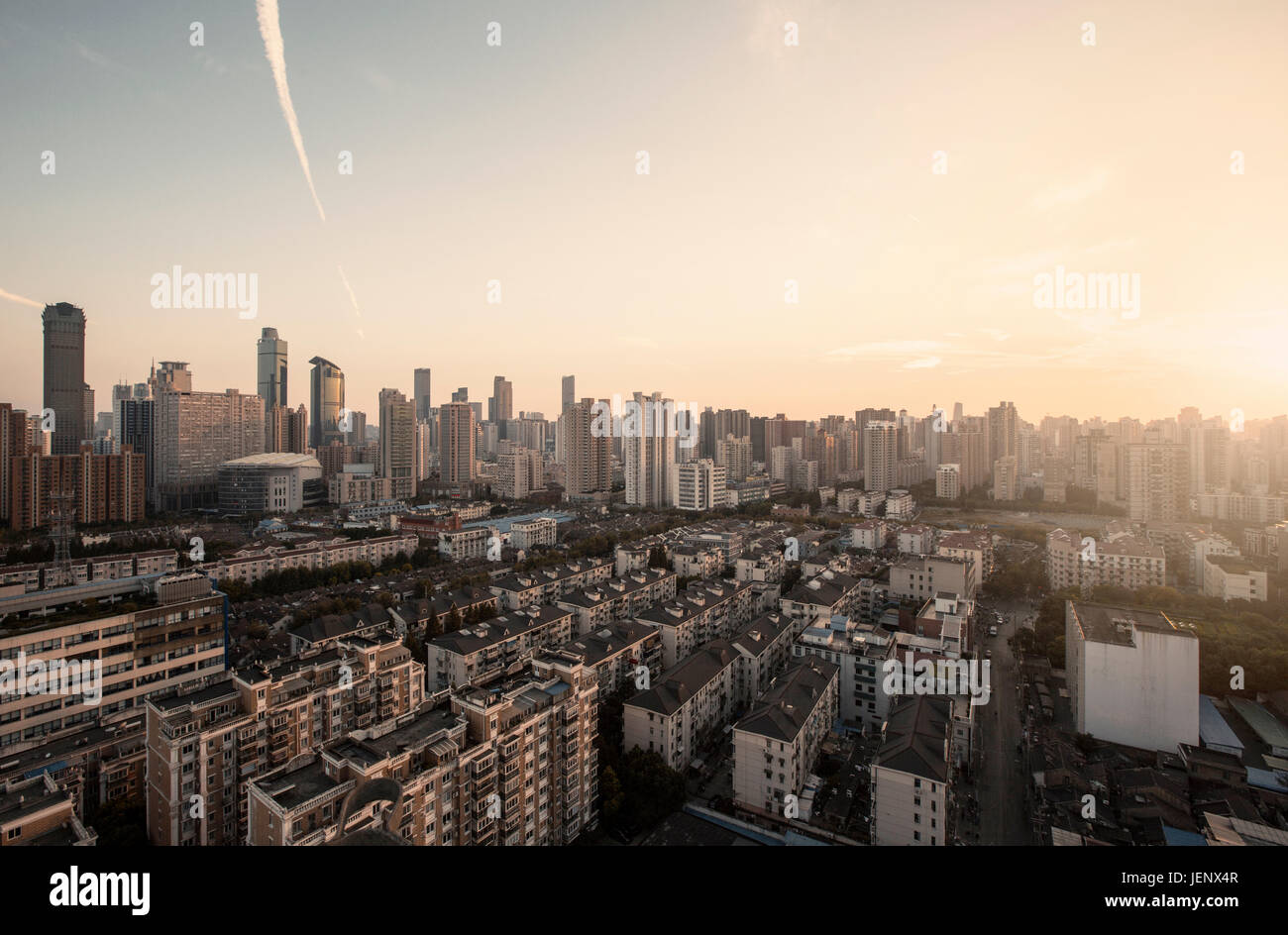 Cityscape at sunset Stock Photo - Alamy