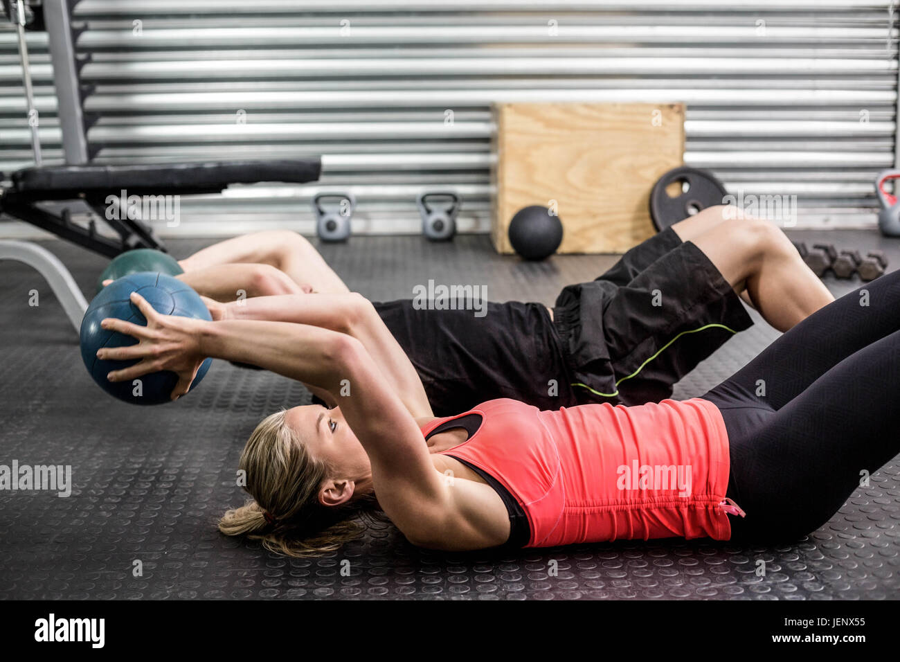 Sporty couple doing abs hi-res stock photography and images - Alamy