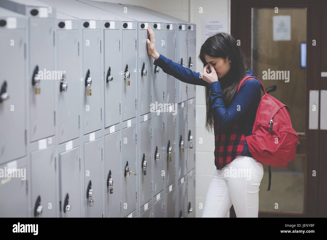 Upset female student leaning hi-res stock photography and images - Alamy