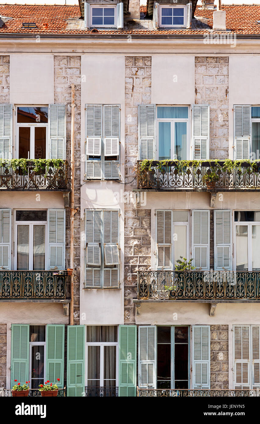 Building with window shutter Stock Photo - Alamy