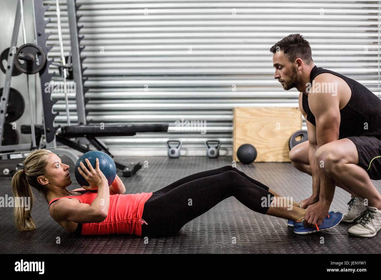 Fit couple doing abdominal ball exercise Stock Photo - Alamy
