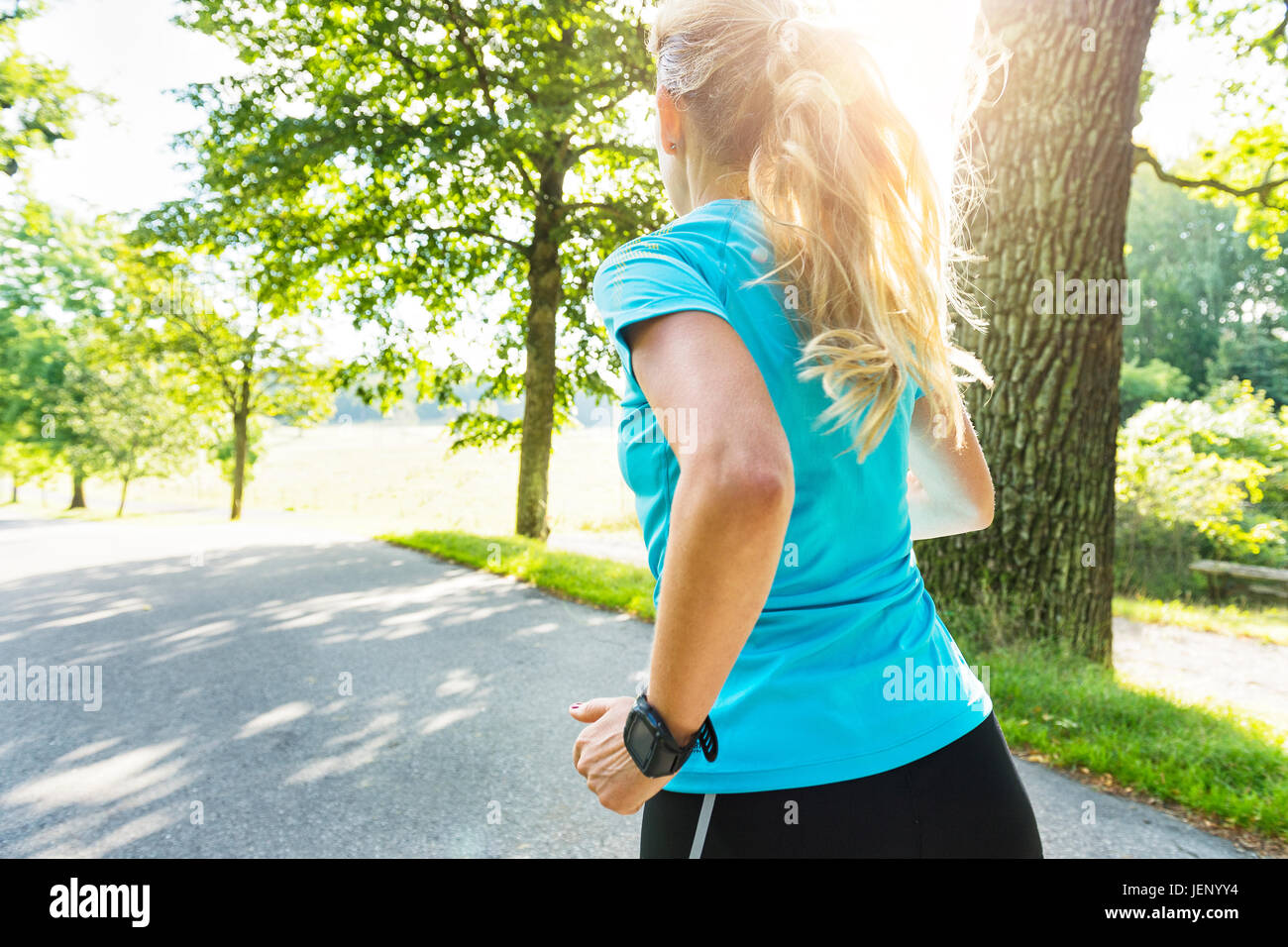 Blonde woman jogging close up hi-res stock photography and images - Alamy