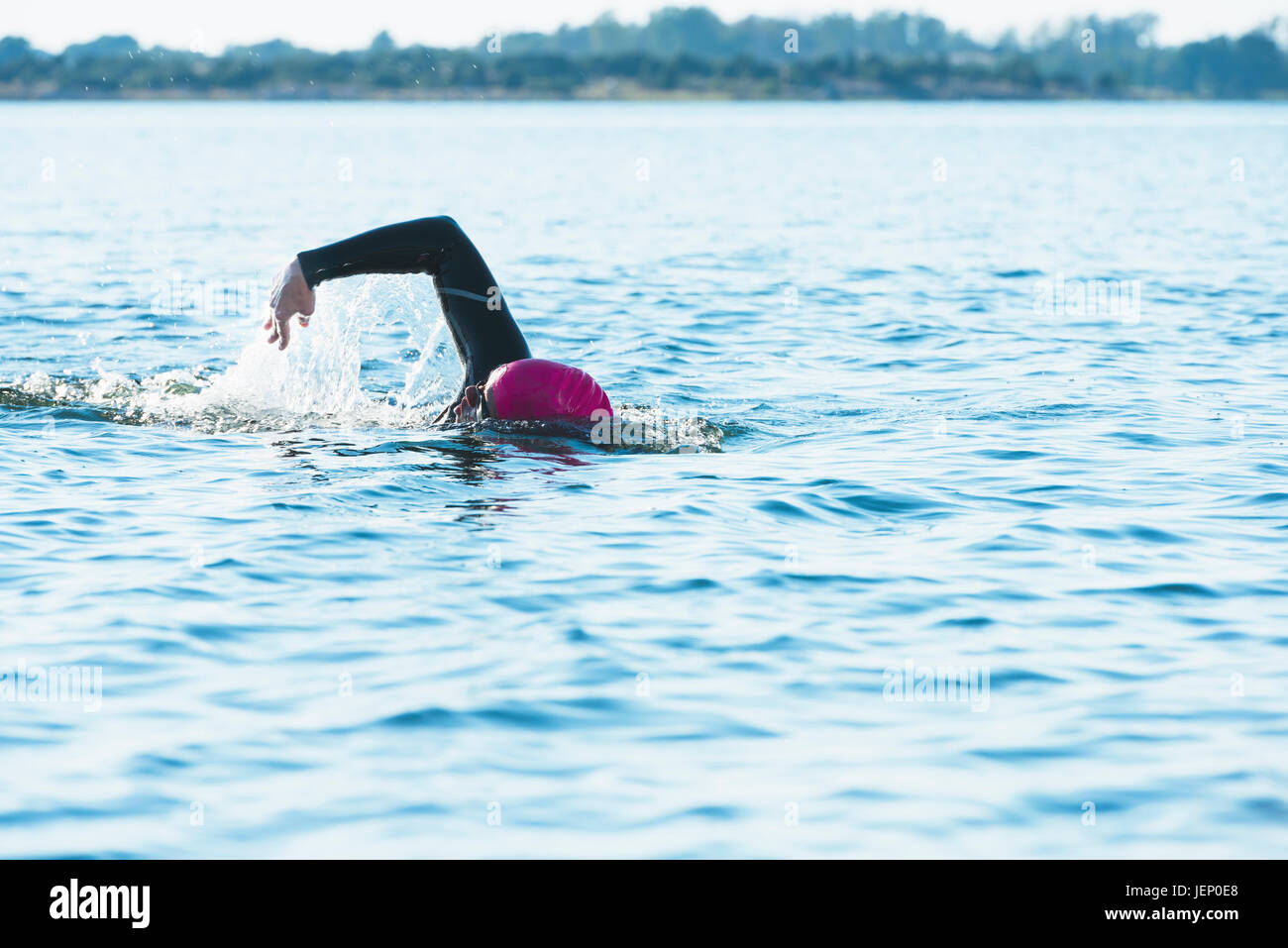 Person swimming in sea Stock Photo - Alamy