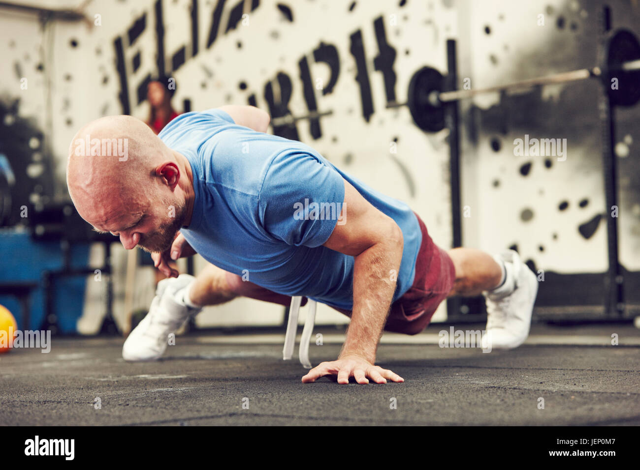 Man making push ups Stock Photo - Alamy
