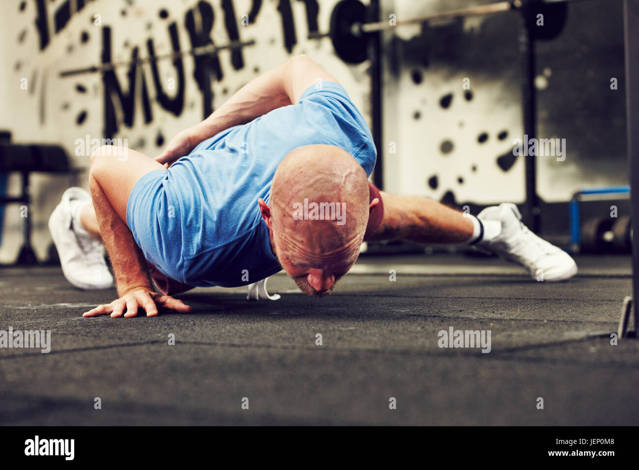 Man making push ups Stock Photo - Alamy