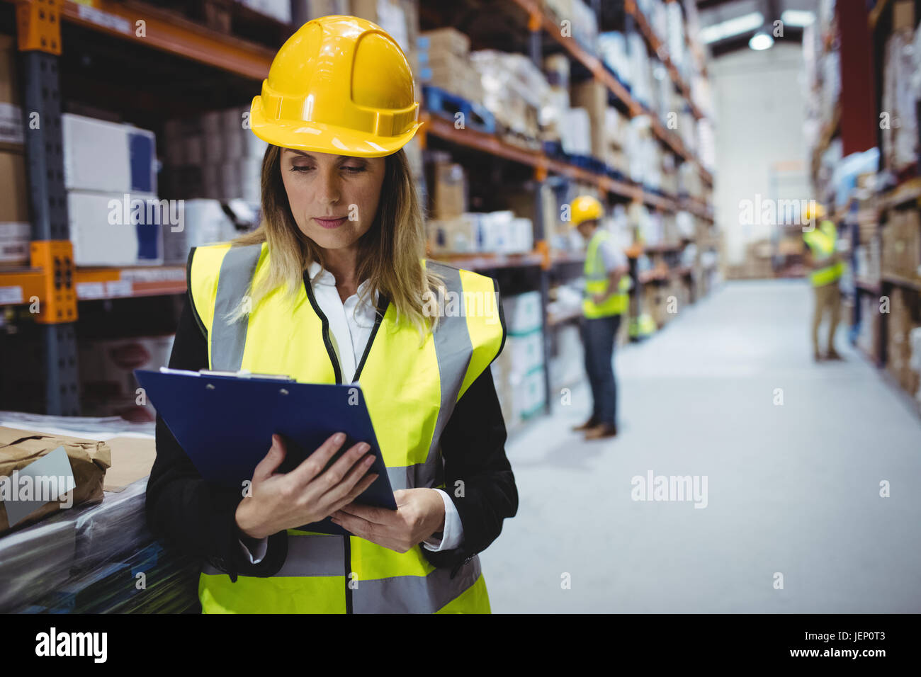 Portrait of smiling warehouse manager Stock Photo - Alamy