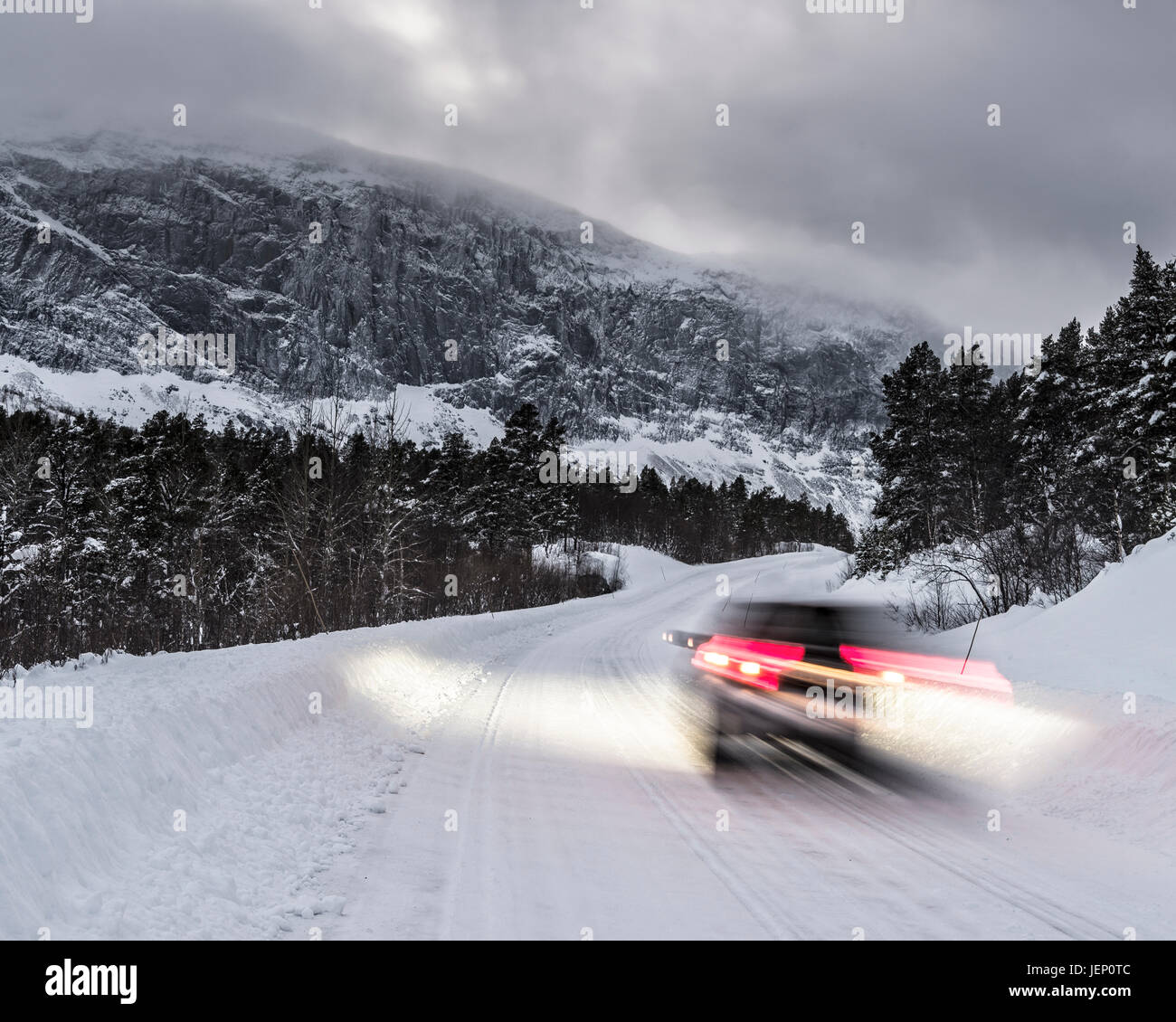 Car on country road Stock Photo - Alamy