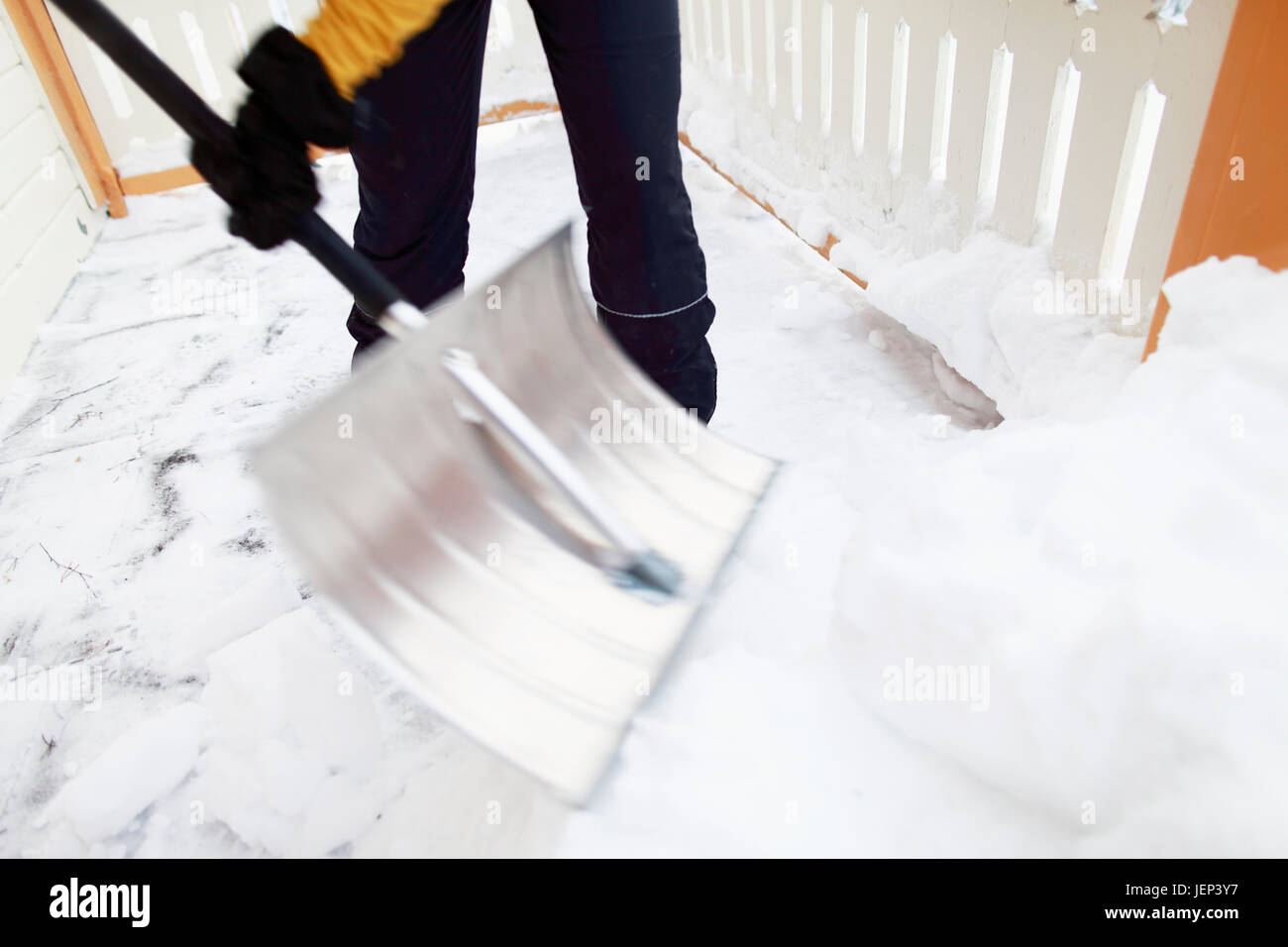 Shovelling snow hi-res stock photography and images - Alamy
