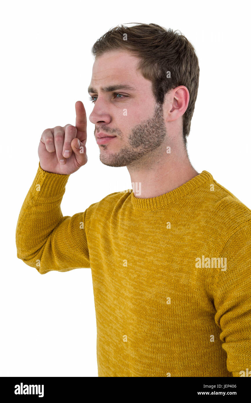Hipster man pointing in the air Stock Photo - Alamy