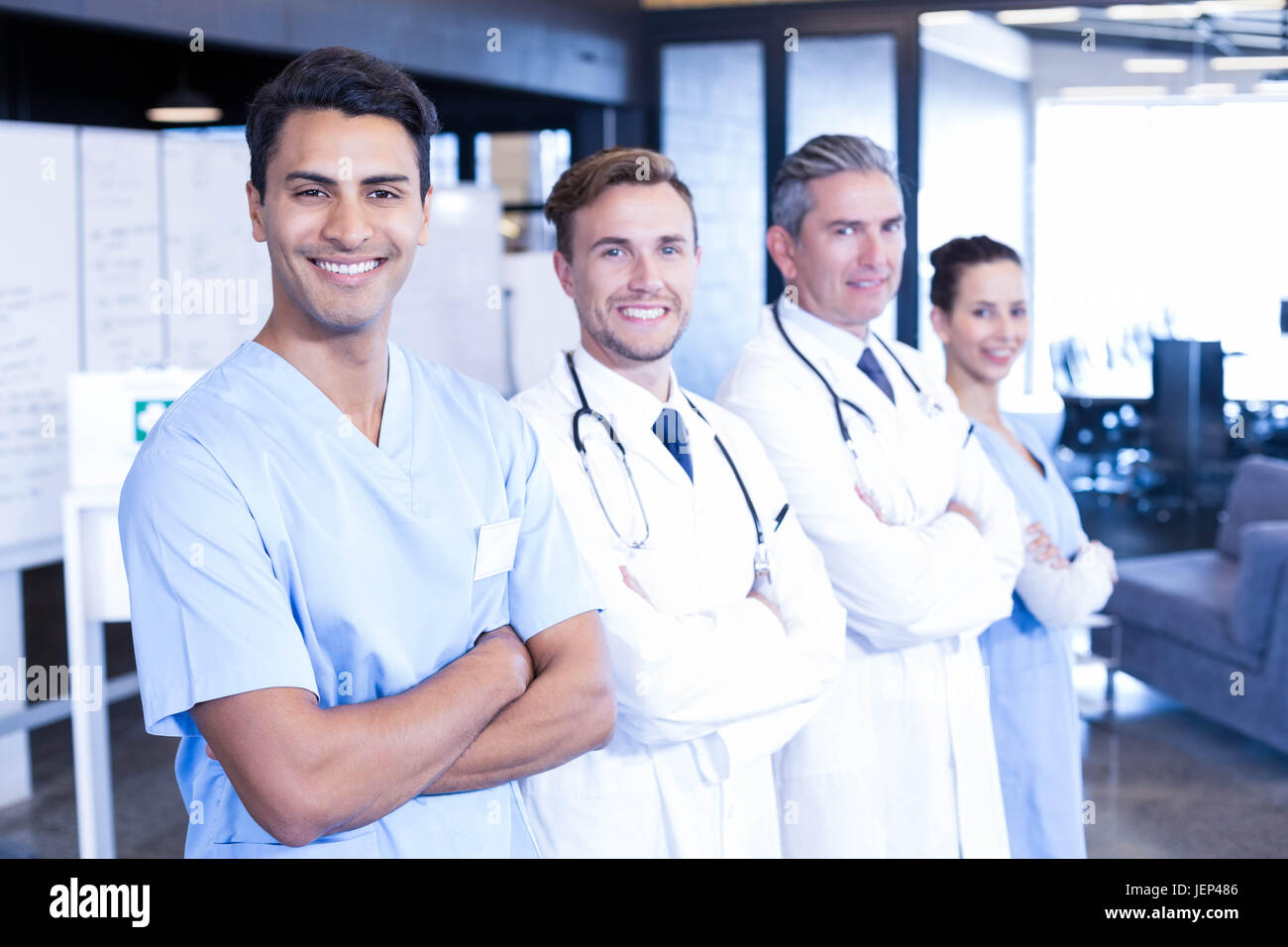 Portrait of medical team standing together Stock Photo - Alamy