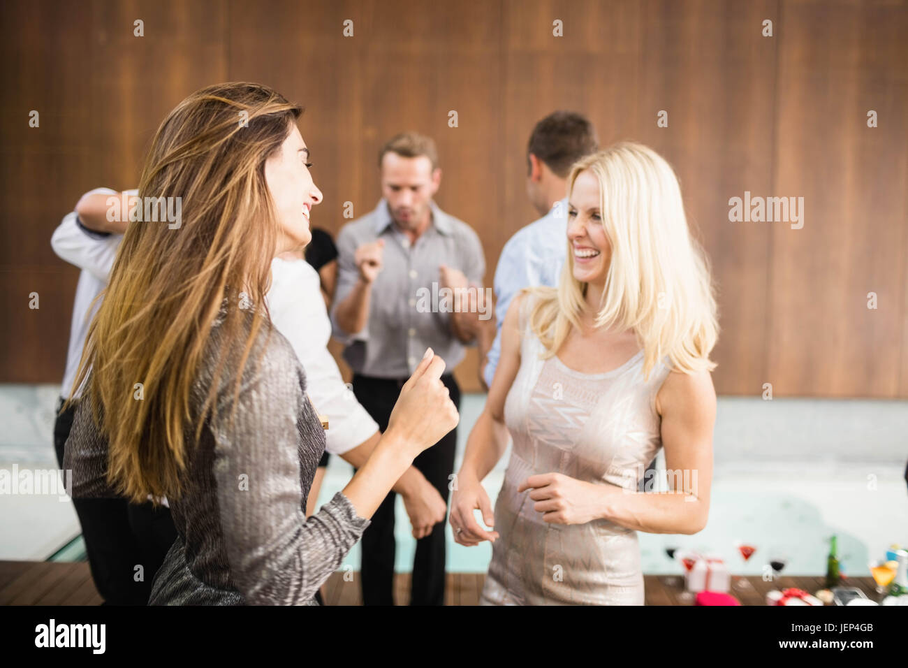 Group of young friends dancing Stock Photo - Alamy
