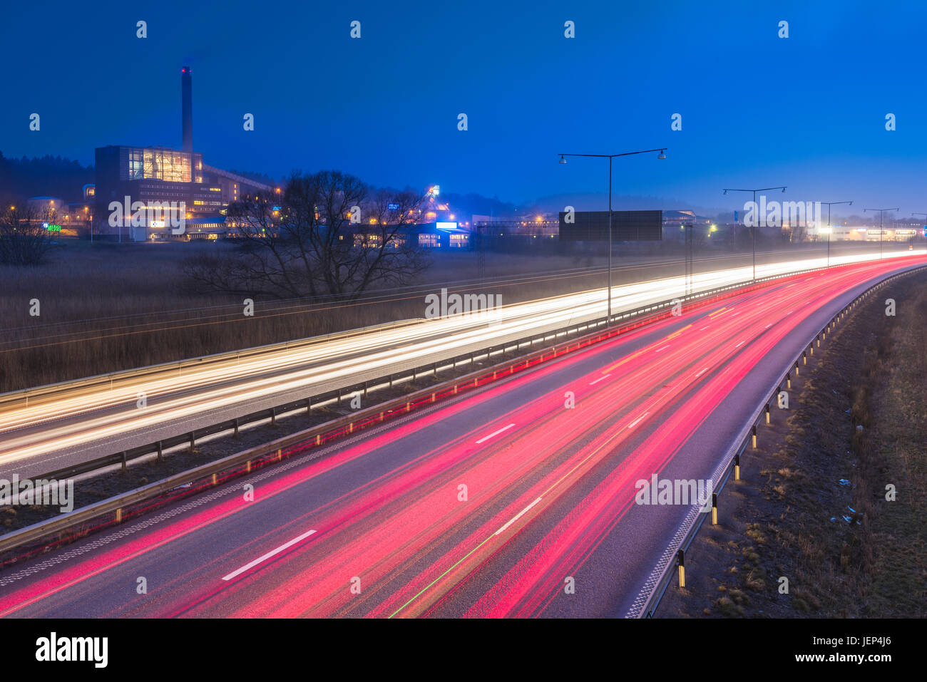 Car lights on road hi-res stock photography and images - Alamy