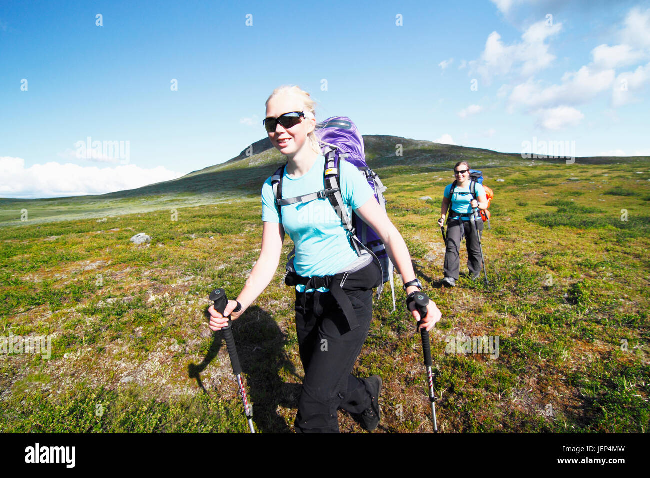 Teenage girls hiking in mountains Stock Photo - Alamy