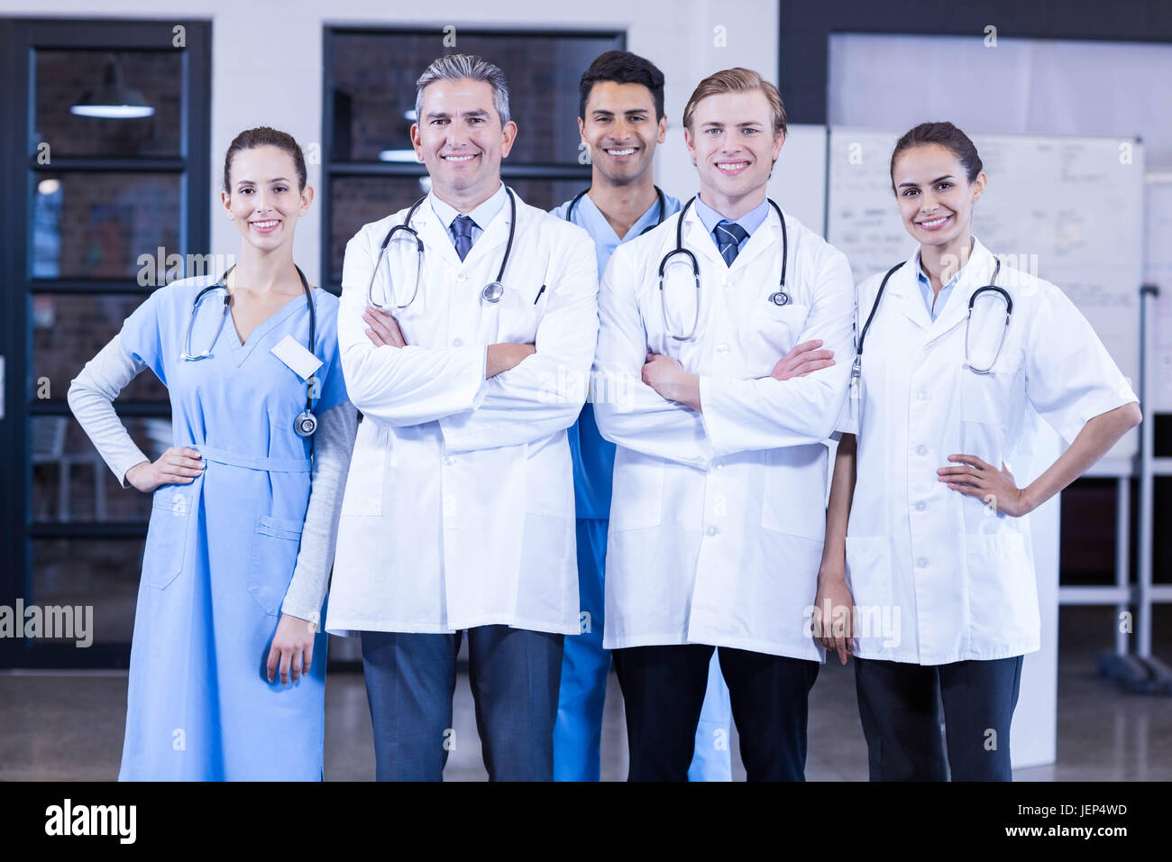 Portrait of medical team standing together Stock Photo - Alamy