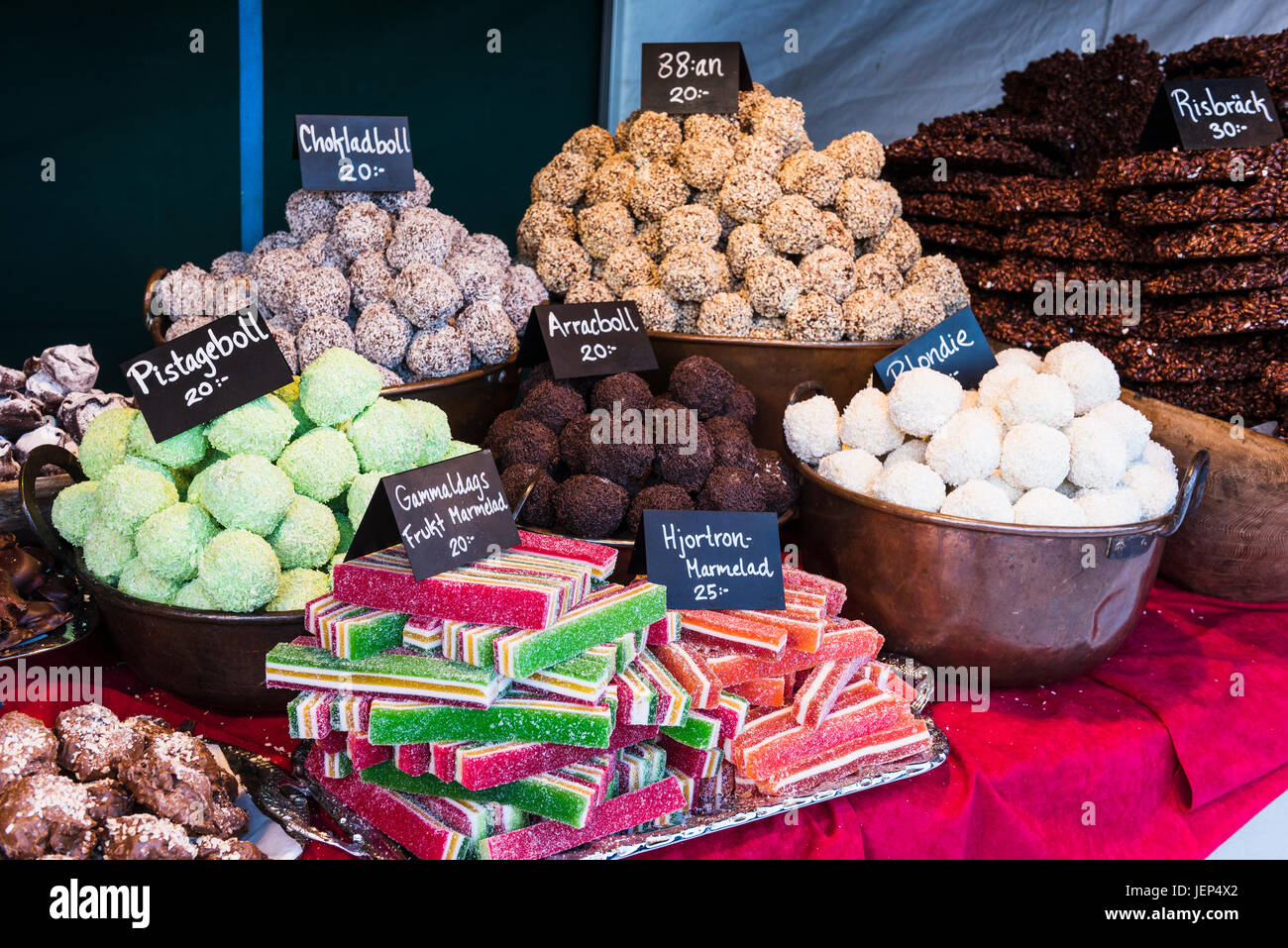 Various sweets on market stall Stock Photo - Alamy