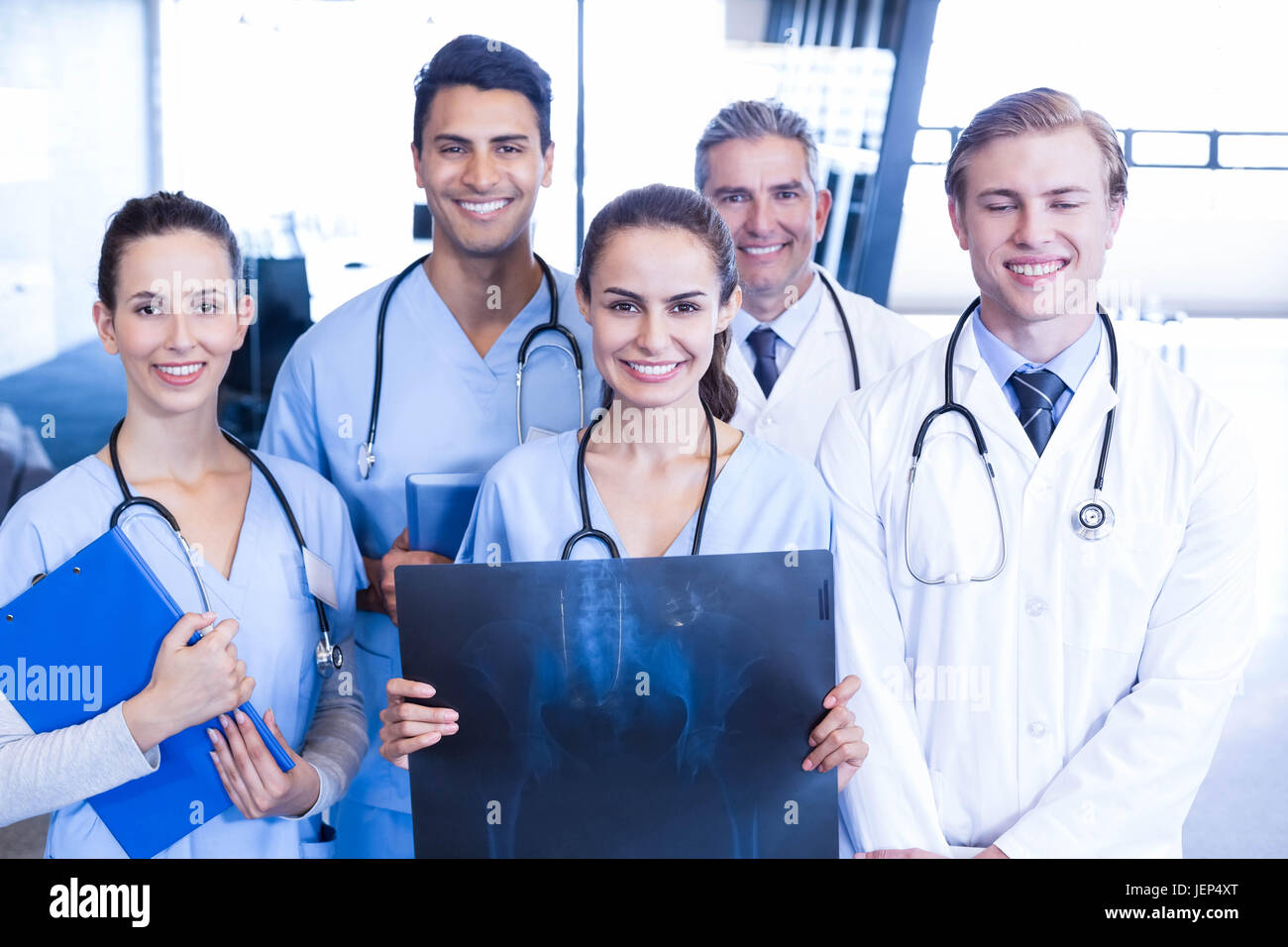 Portrait of medical team standing together Stock Photo - Alamy
