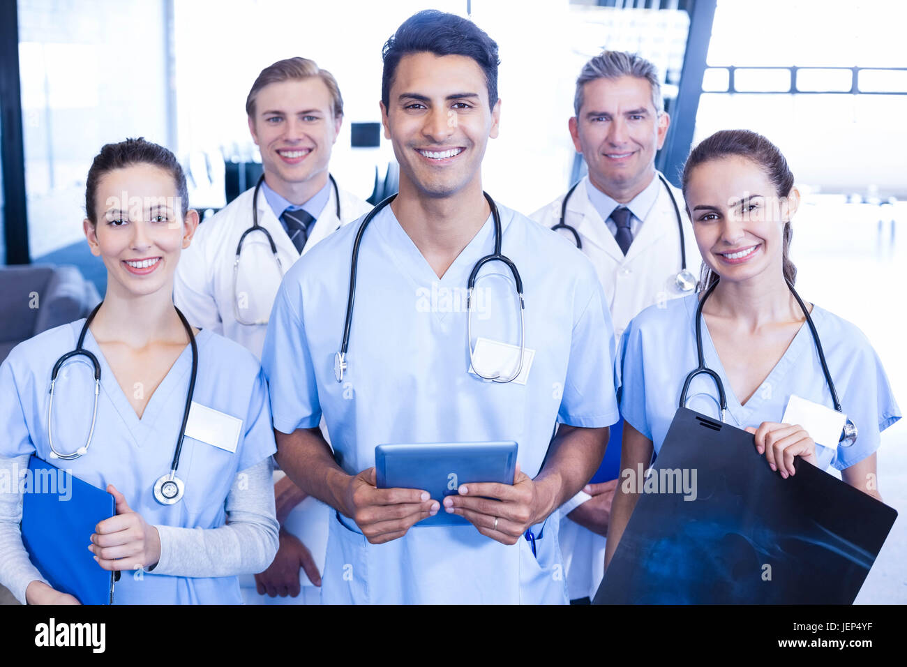 Portrait of medical team standing together Stock Photo - Alamy