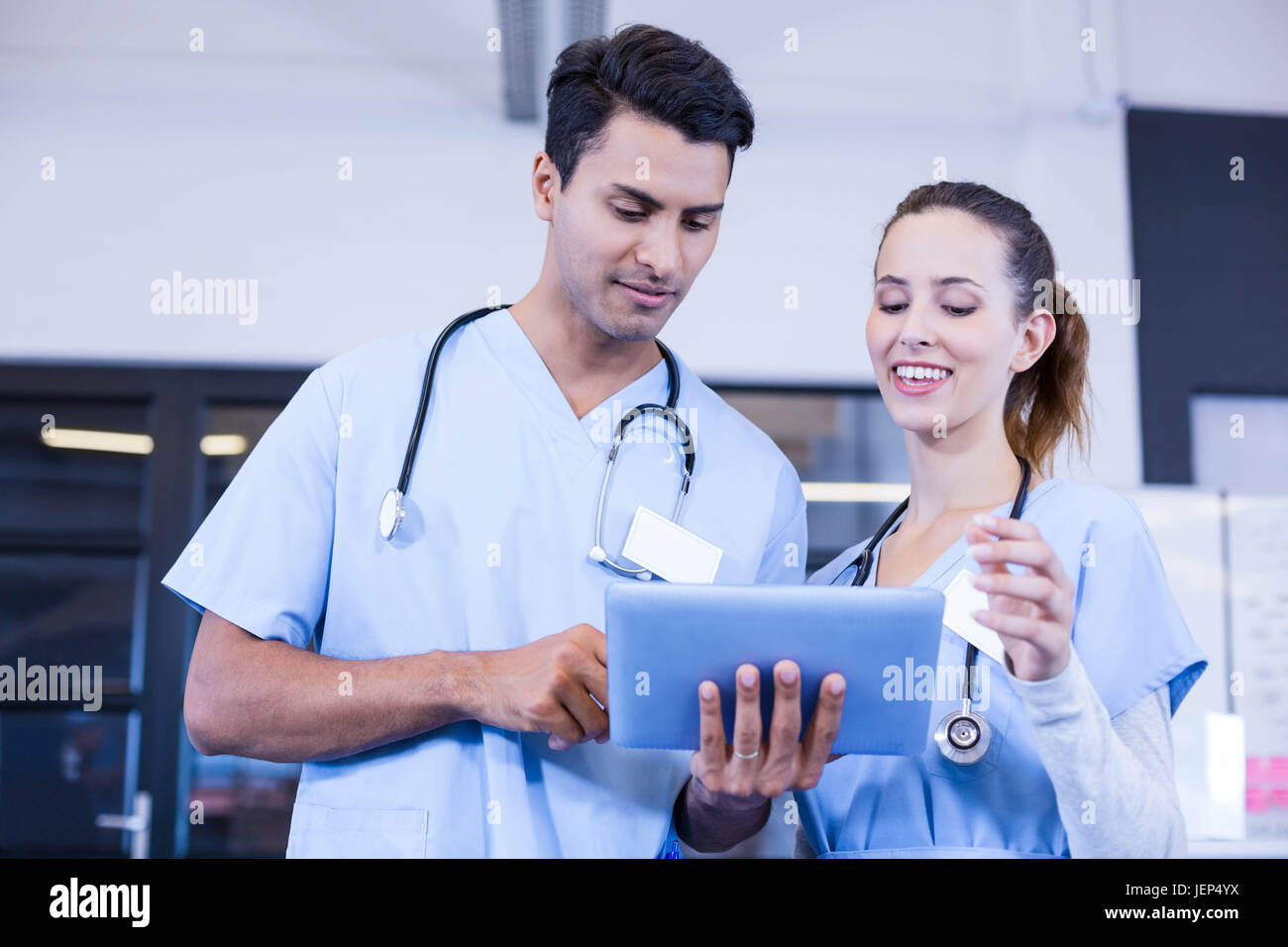 Young indian doctor using digital hi-res stock photography and images ...