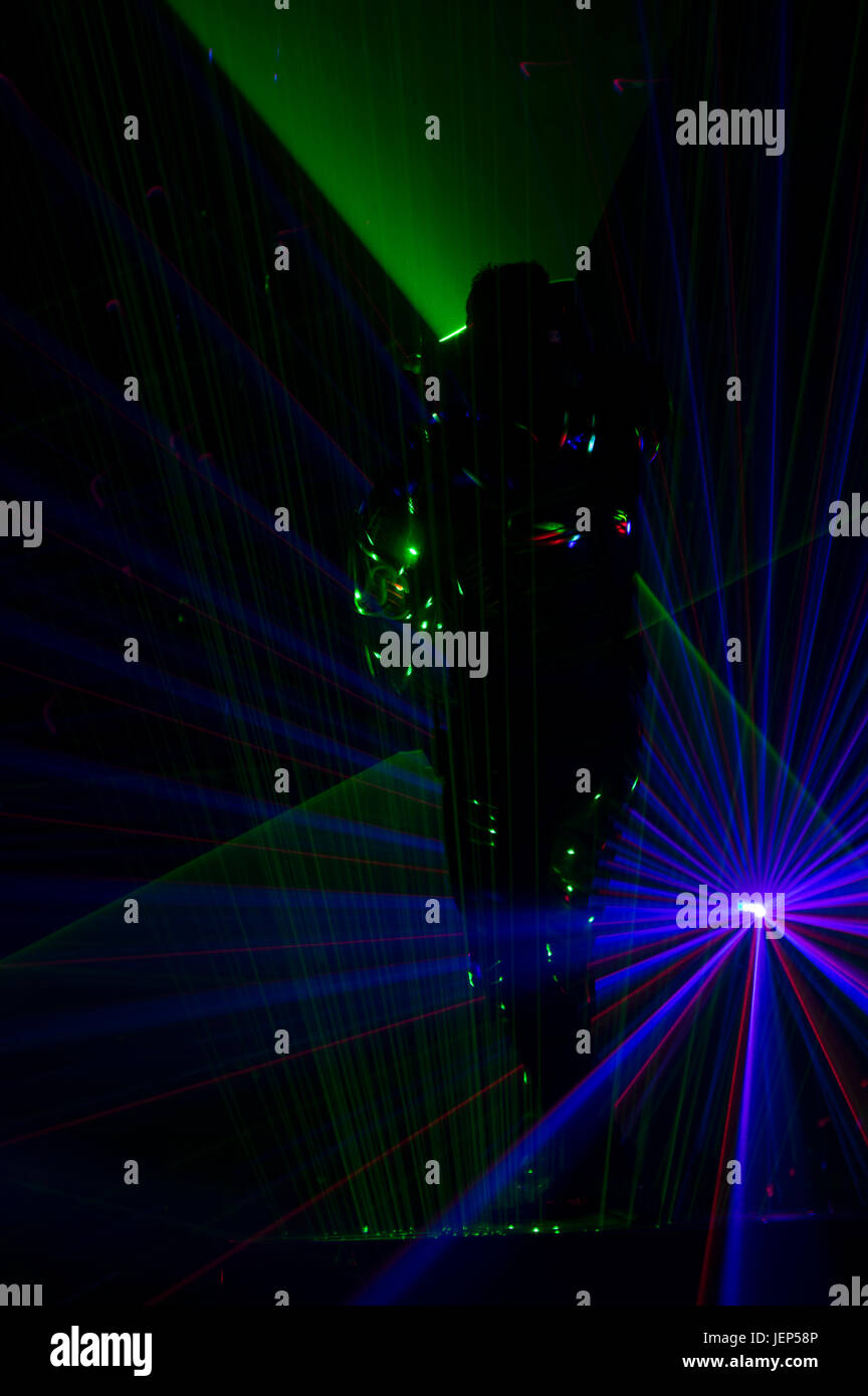 Disco dance with special light effects and fantastic laser show. Blue ...