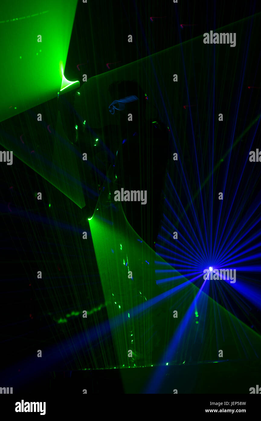 Disco dance with special light effects and fantastic laser show. Blue ...