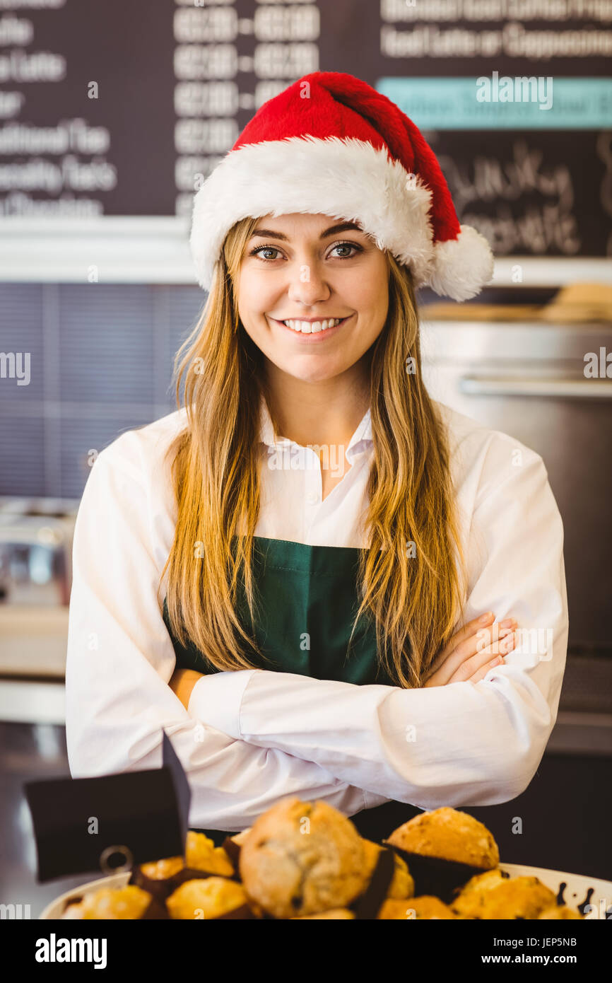 Cute waitress standing behind the counter Stock Photo - Alamy